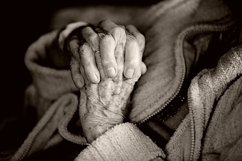 clasped hands - Marc Brisson